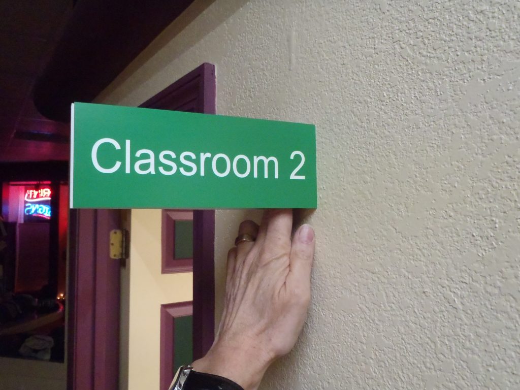 Angled Wall Signs – Graphics Plus